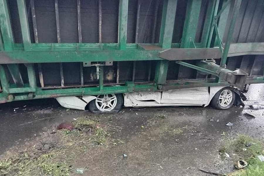 Cargo container smashes car, four of a family and driver escape death ...