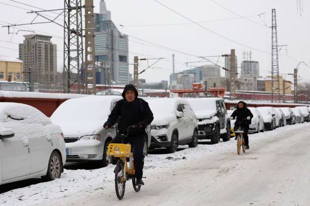 Parts of China gripped by record-low temperatures as icy snap ...