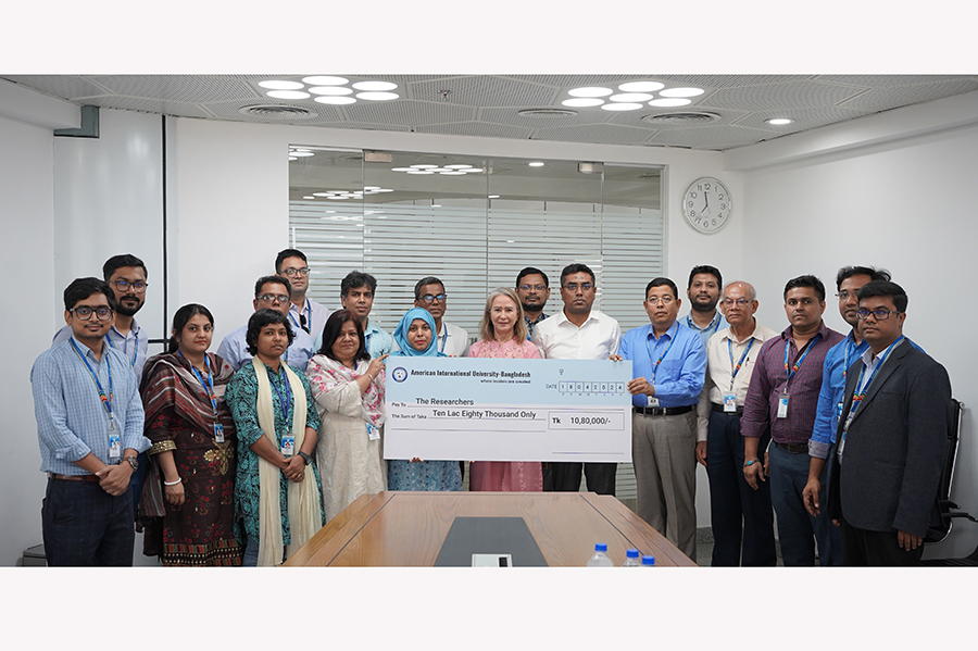 Cheque handover ceremony for researchers held at AIUB | The Financial ...