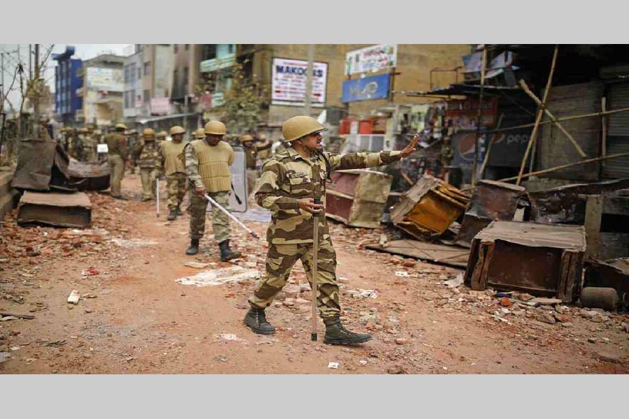 Scars of violence haunt Delhi after deadly riot | The Financial Express